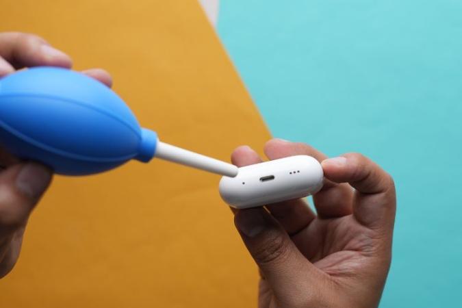 How to Clean AirPods and Charging Case [2025 Guide] | Beebom